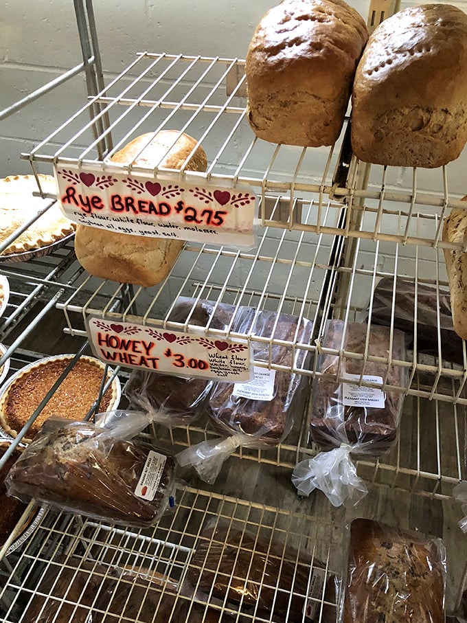 The bread aisle we deserve. Handwritten labels tell you what's what, but your nose already knows—this is the real deal.