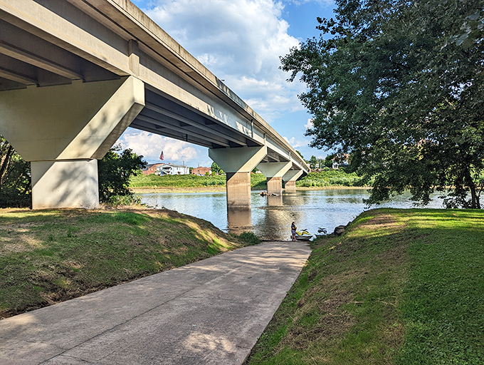 The bridge between everyday life and river adventures—quite literally. This paved path invites both serious explorers and casual wanderers.
