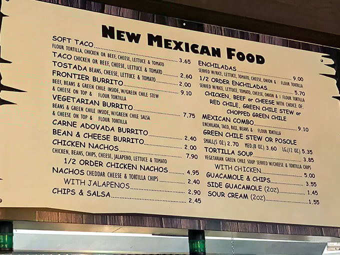This menu board isn't just a list of food—it's a roadmap to happiness, with each item promising a different journey into New Mexican flavor.