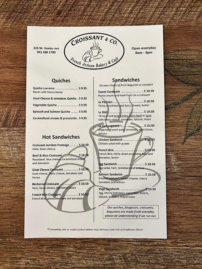 The menu reads like a love letter to French classics, with quiches and croissant sandwiches taking center stage.