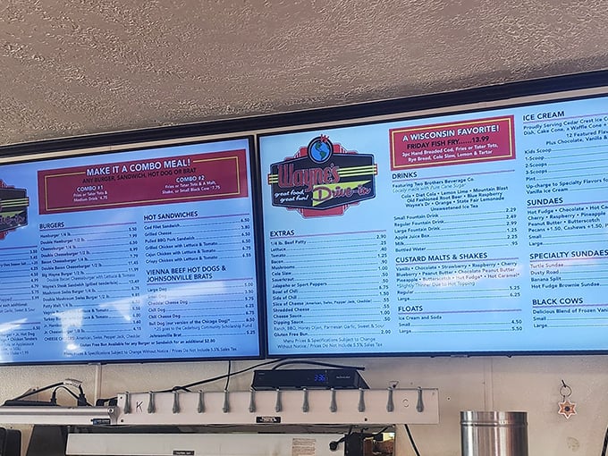 The menu board reads like a love letter to American classics. No molecular gastronomy here—just honest food that makes your cardiologist nervously check their retirement plan.