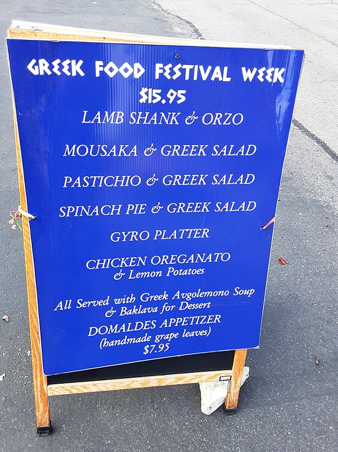 The Greek Food Festival Week sign promises Mediterranean magic – lamb shank, moussaka, and baklava that'll transport you straight to Athens.