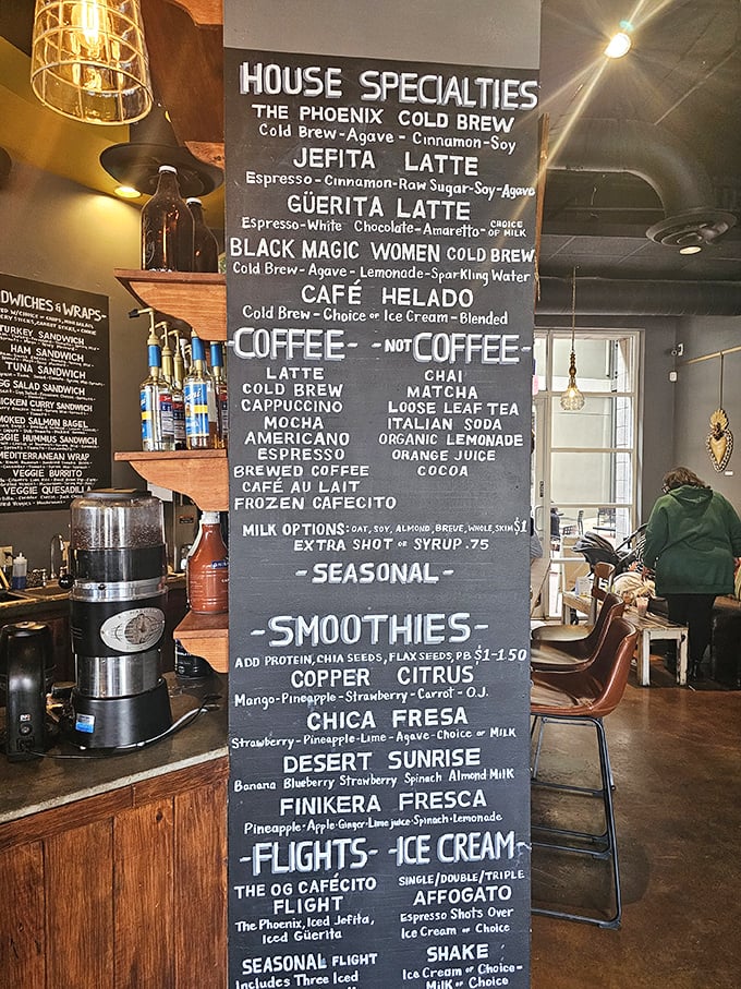 This chalkboard menu isn't just listing drinks—it's offering a roadmap to your perfect morning with intriguing names like "Black Magic Women Cold Brew."