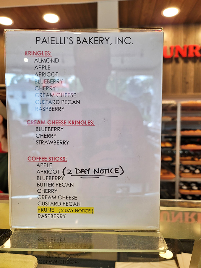 This menu board is basically a roadmap to happiness. Note the "2 DAY NOTICE" for certain items—some pleasures are worth planning for.