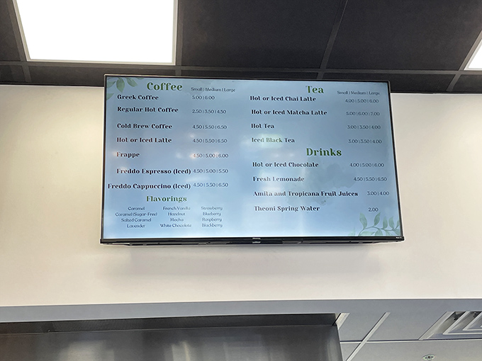 A menu board that doesn't require a translator or second mortgage—just straightforward coffee, tea, and treats that deliver on their simple promises.