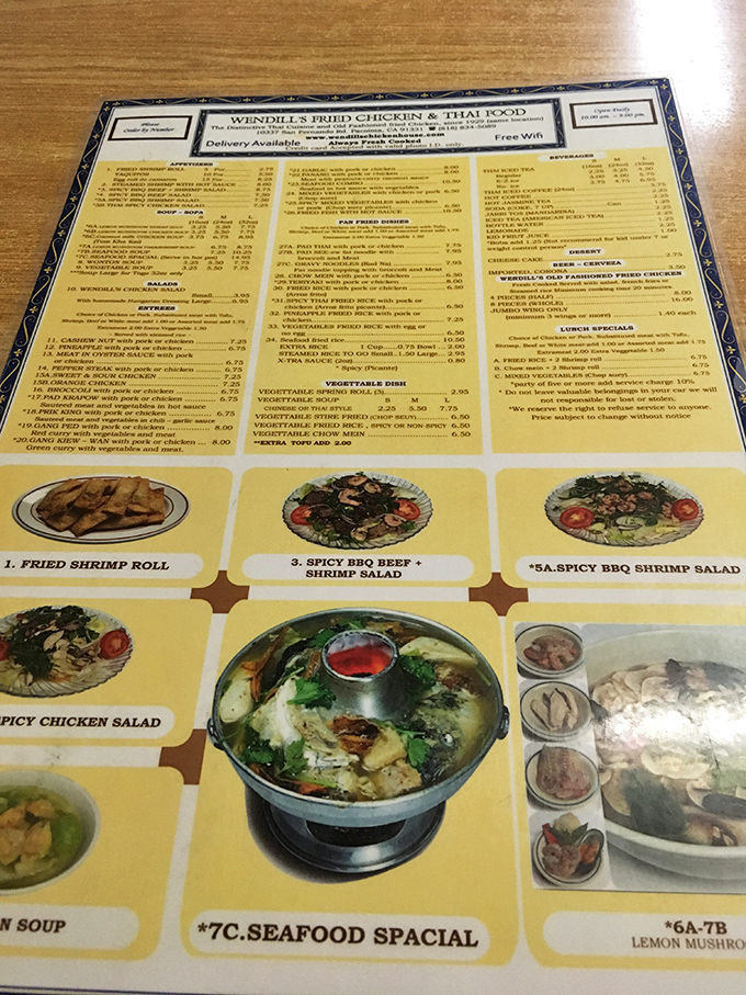The menu reads like a delicious identity crisis—half American fried chicken classics, half authentic Thai cuisine. It's the tastiest diplomatic summit you'll ever attend.