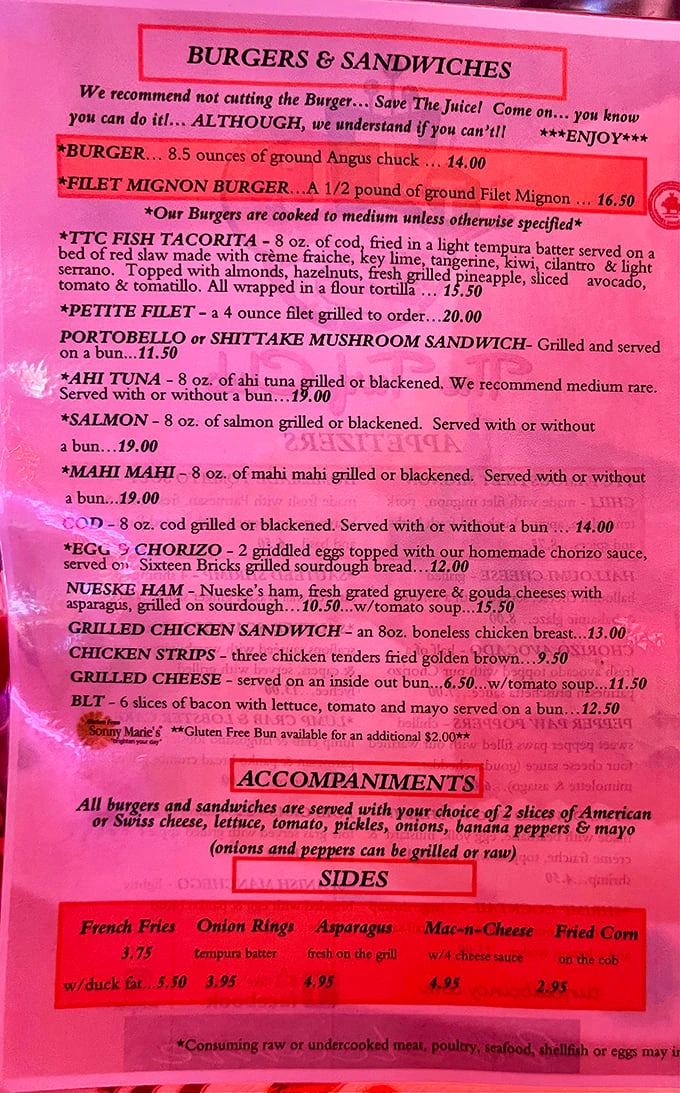 The menu reads like a love letter to comfort food – with that friendly reminder not to cut your burger. Save the juice, indeed!