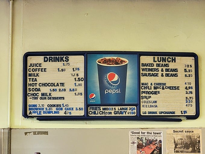 A menu board that's refreshingly analog in our digital world. No QR codes here—just honest food at prices that feel like a clerical error in 2023.