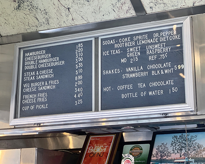 Simplicity is the ultimate sophistication. This no-frills menu board proves you don't need fancy options when you've perfected the classics.