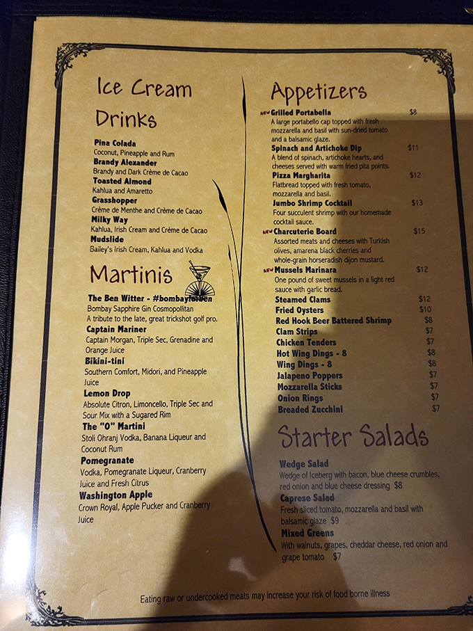 This menu isn't just a list of options—it's a roadmap to happiness with martinis named after golf pros and appetizers worth fighting over.