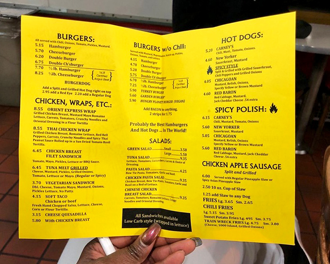 The bright yellow menu is as cheerful as the exterior, offering a roadmap to comfort food paradise that locals have treasured for decades.