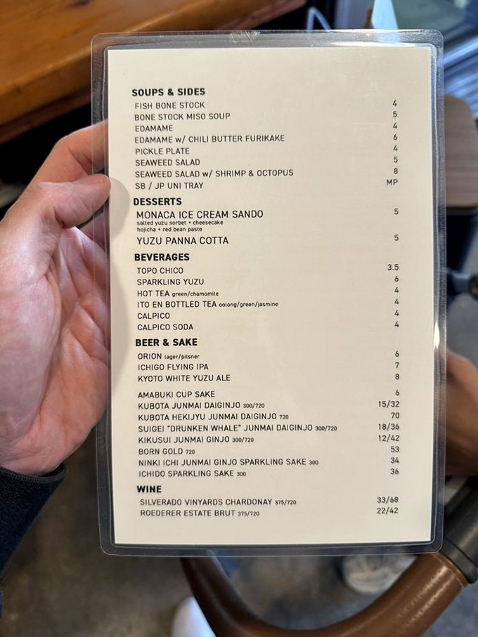 This menu reads like a haiku of deliciousness – bone stock miso soup, yuzu panna cotta, and sake selections that would make Tokyo jealous.