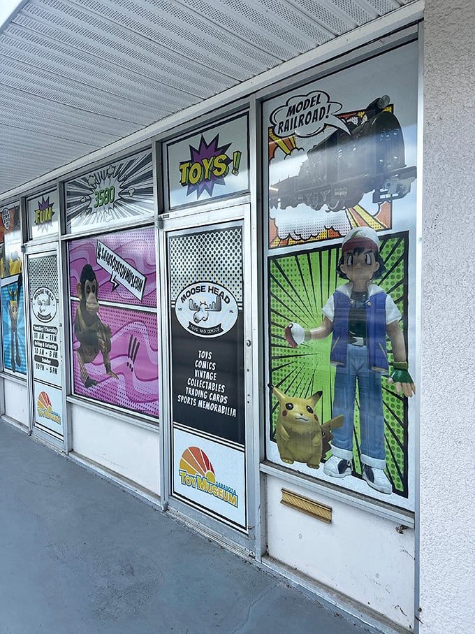 Comic book aesthetics leap from the page to the storefront. These vibrant window displays showcase everything from Pokémon to model railroads with nostalgic flair.