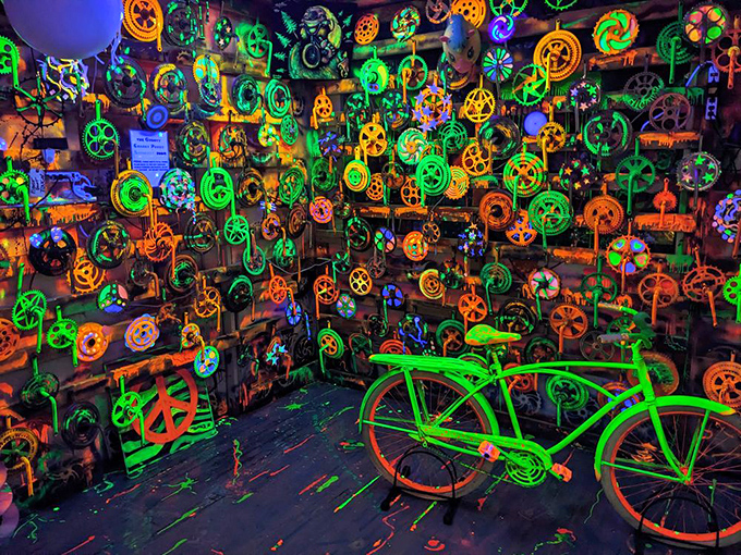 Step into the psychedelic neon room where bicycle wheels transform into glowing works of art under blacklight—a trippy time capsule of cycling wonder.