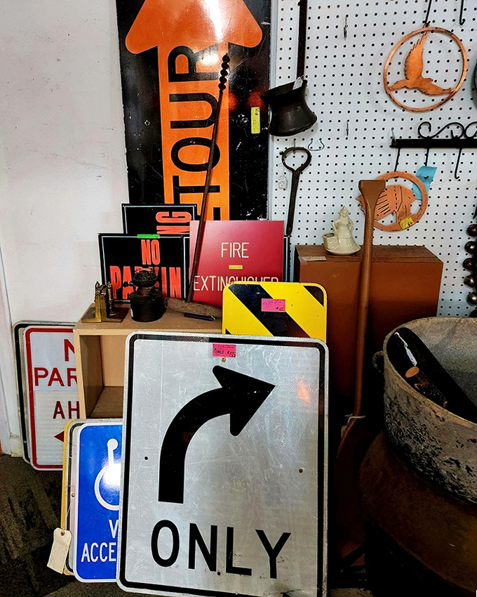 A collection of vintage road signs that could decorate your man cave or simply help you remember which way is "RIGHT ONLY" after too many garage sale mimosas.
