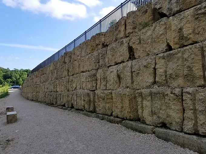 These limestone blocks aren't just a wall – they're pages from Earth's autobiography, telling a 450-million-year-old story of ancient seas and patient geology.