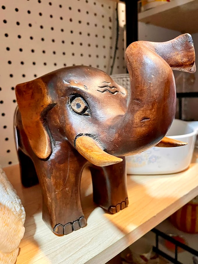 This wooden elephant isn't just decor—it's a passport to conversations about travels never taken and adventures yet to come.