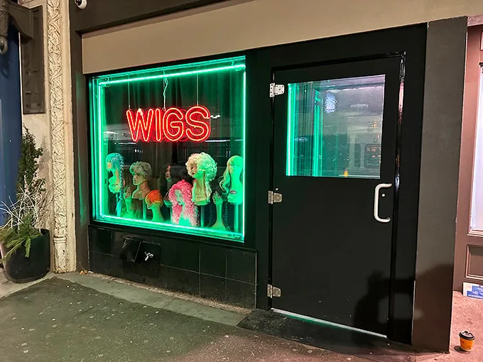 Behind that quirky "WIGS" sign lies Boston's best-kept secret—a steakhouse speakeasy that would make Prohibition proud.