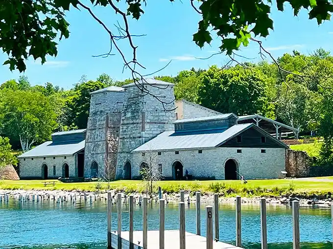 Fayette's historic stone buildings tell tales of Michigan's industrial past, now standing like ancient ruins against a backdrop of natural beauty.