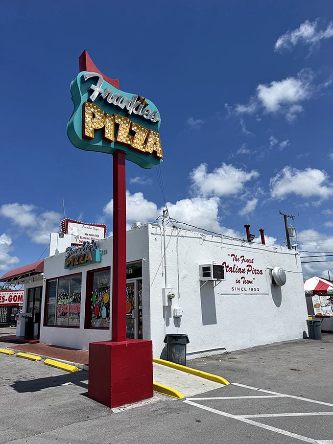 That vintage sign at Frankie's Pizza isn't retro by design – it's authentic by longevity. Miami's square slice legend!