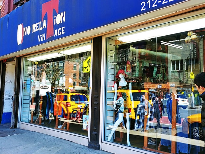 L Train Vintage's vibrant blue storefront promises the thrill of the hunt with mannequins dressed better than most passersby.