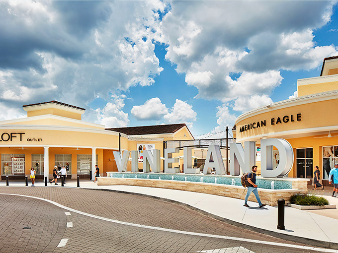 Yellow stucco and designer logos—a match made in shopping heaven just minutes from Mickey's neighborhood.