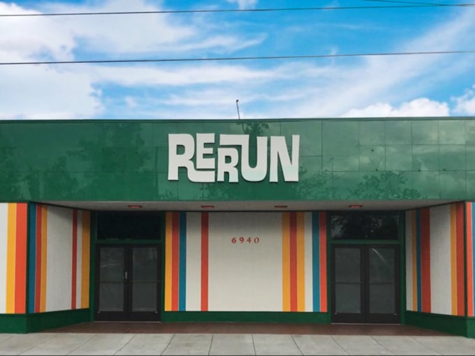 Rerun's rainbow-striped facade is like the thrift store equivalent of a Wes Anderson film set—quirky, colorful, and full of character.