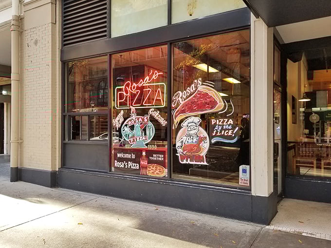 That neon glow isn't just for show – it's Rosa's beacon calling all New York-style pizza lovers home to this Atlanta institution.