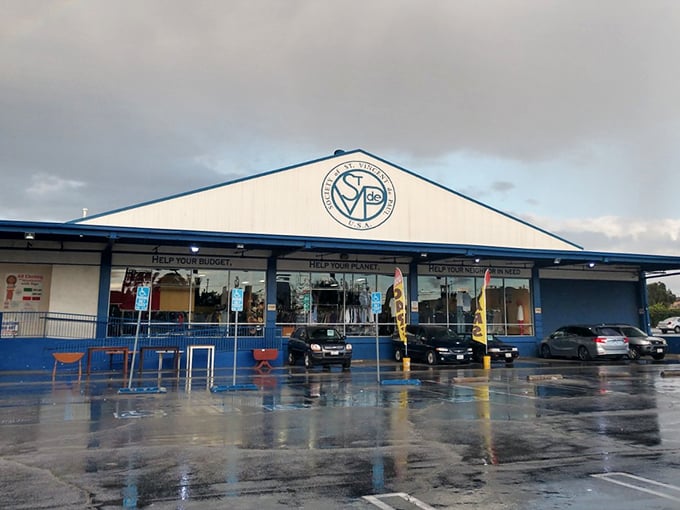 St. Vincent de Paul's blue-roofed wonderland gleams after a rain shower, reflecting both sky and thrifting dreams.