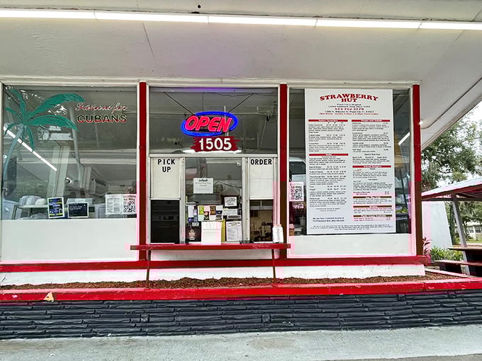 Strawberry Hut's walk-up window whispers secrets of Plant City's sweetest treasures – strawberry shortcake that makes grown men weep.