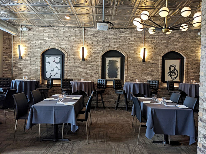 Exposed brick walls, elegant lighting, perfectly set tables—Bowdie's dining room feels like your sophisticated friend who also knows how to have fun.