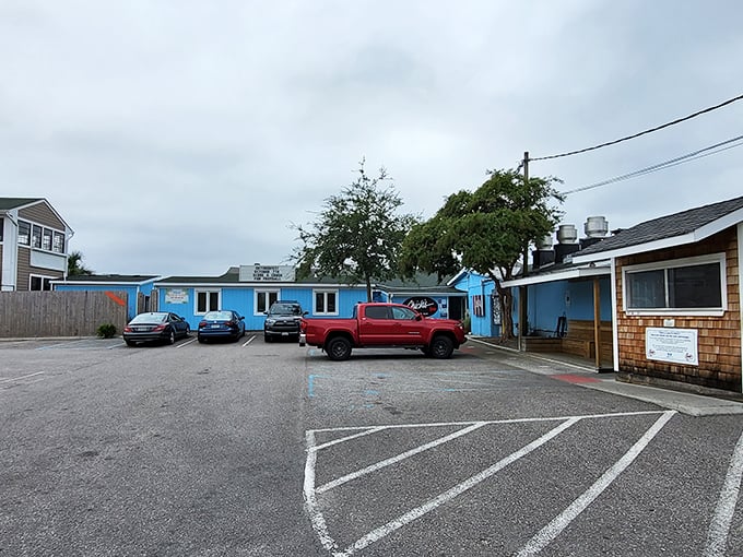 The blue buildings of Chick's Oyster Bar stand ready for your seafood pilgrimage – where Virginia Beach locals go when tourists aren't looking.