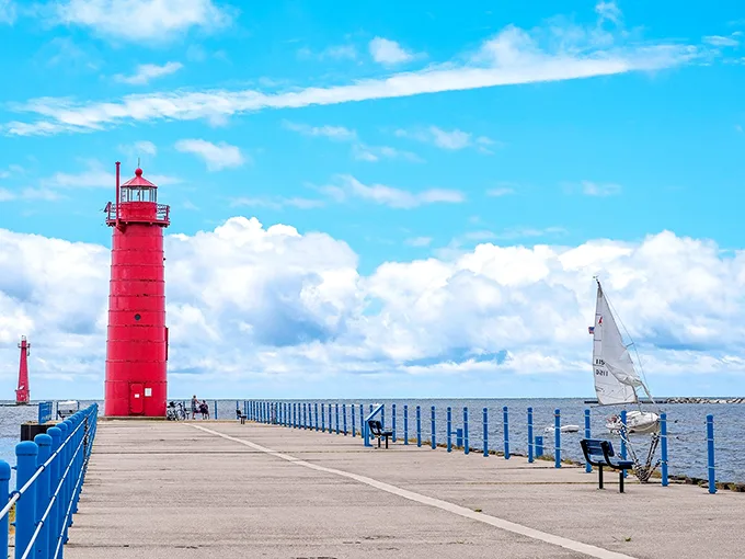 Muskegon's red lighthouse: "That red lighthouse isn't just Instagram-worthy – it's the beacon of affordable lakefront living that won't sink your retirement budget."