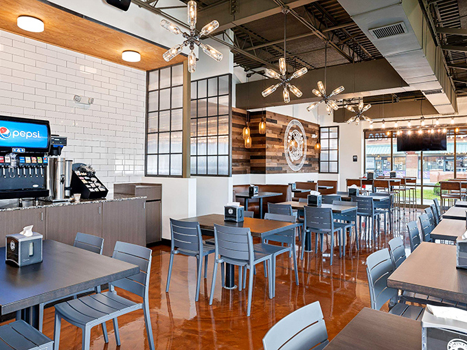 Modern lighting and clean design complement the real star here – pizza bigger than your appetite.