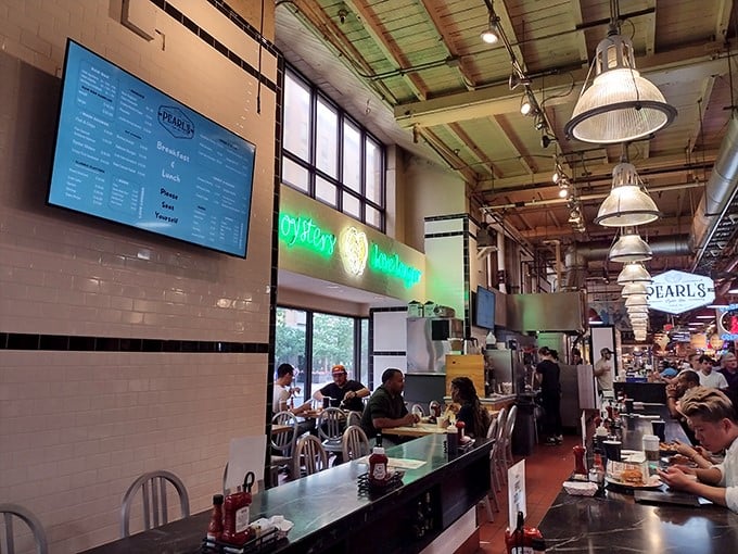 Simple metal stools, industrial lighting, and seafood that makes you forget you're in a market instead of oceanside.