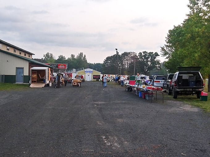 Gravel lot gold rush! Tables laden with yesterday's treasures await shoppers who know that one person's "junk" finances another person's lunch.