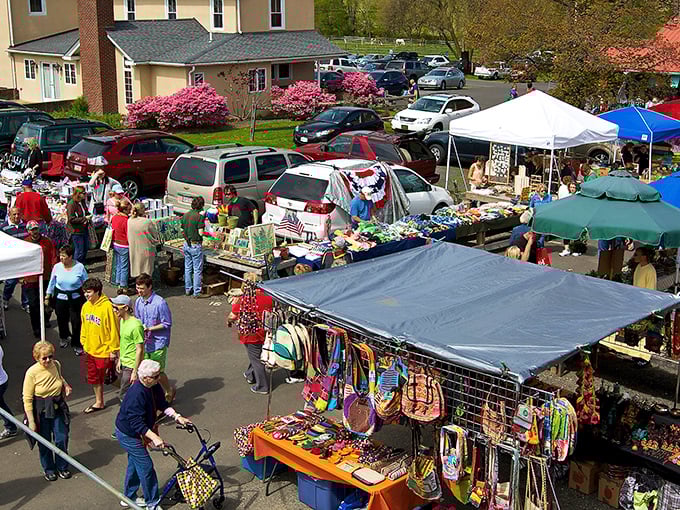 Summer shopping in full swing! Rice's Market vendors display their colorful wares under tents as shoppers navigate the treasure maze.