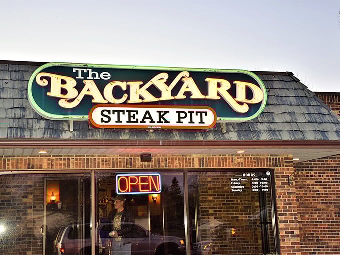 No pretension, just promise – that simple sign tells you exactly what matters here: exceptional steak in a cozy setting.