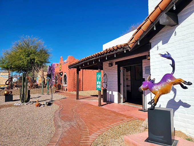 A purple horse sculpture stands guard outside Tubac's adobe shops, proving desert art has a sense of humor.