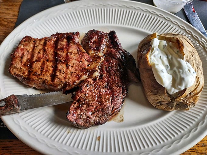 A perfectly grilled ribeye alongside a loaded baked potato – the Midwest's answer to filet mignon and foie gras.