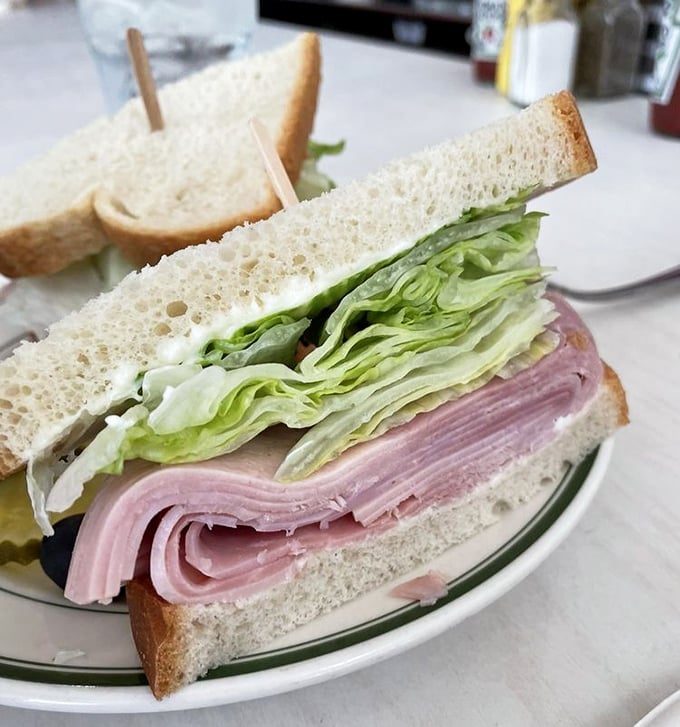 This Southern Baked Ham sandwich isn't trying to impress Instagram – it's too busy impressing your taste buds with thick-cut ham, crisp lettuce, and the perfect bread-to-filling ratio.