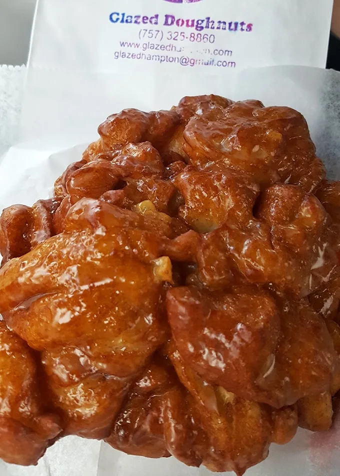 This isn't just an apple fritter – it's a glistening monument to what happens when apples and dough have a magnificent romance.