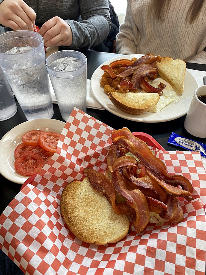 Bacon that extends beyond the bread—a revolutionary concept! This isn't just a sandwich; it's architecture with purpose.