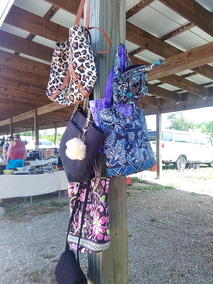 Fashion finds hang like colorful fruit, each purse containing its own mysterious history and promising new adventures.