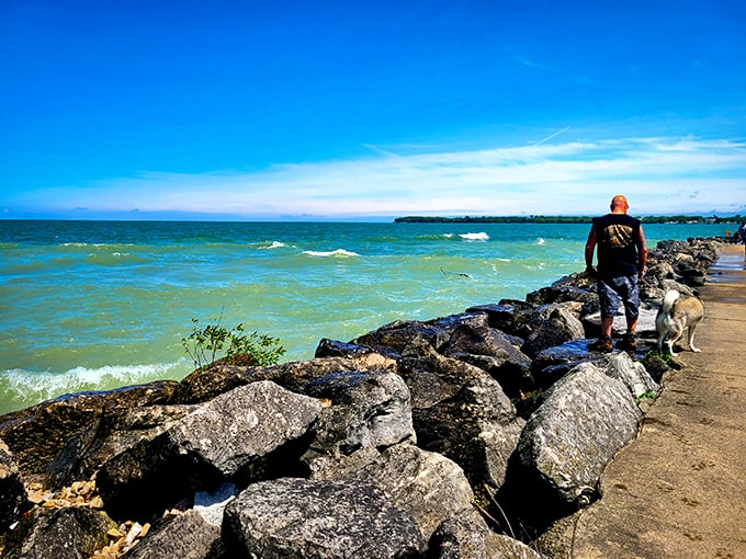 Walking the edge where land meets lake. One misstep and you'll get wet, but with views this gorgeous, who's really keeping score?