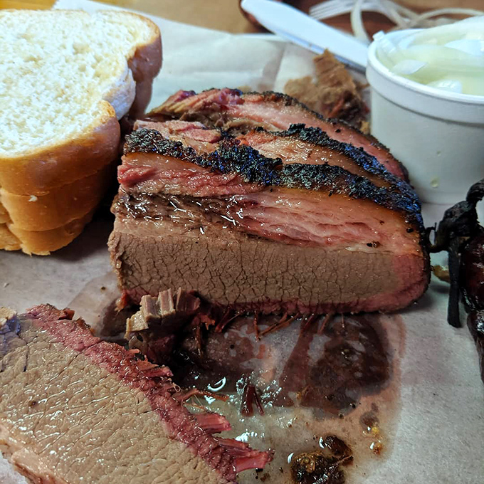 Brisket so perfect it should have its own ZIP code – that smoke ring is like nature's way of saying "you're welcome."