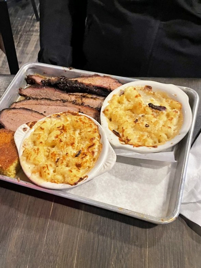 Brisket that doesn't just fall apart—it practically surrenders to your fork with that perfect pink smoke ring intact.