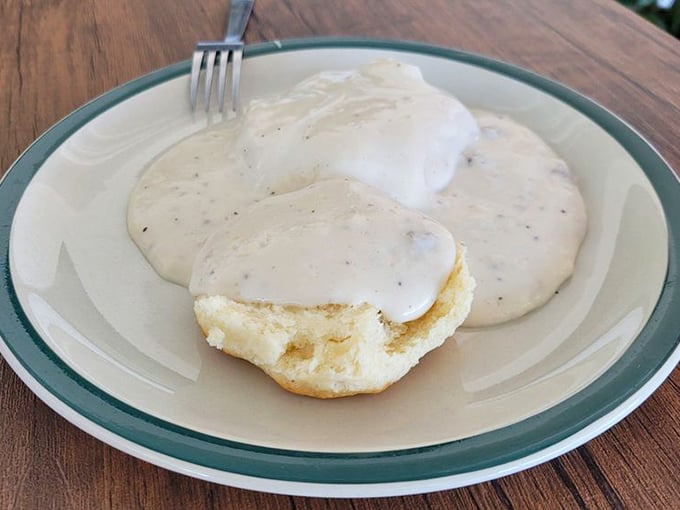Behold, the star of the show! These biscuits and gravy aren't just breakfast, they're an edible love letter to Southern comfort with a Florida accent.