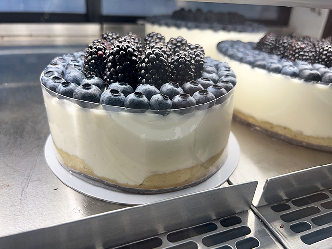 This blueberry cheesecake isn't just dessert—it's edible art. Those plump berries nestled atop creamy perfection would make Michelangelo weep with joy.