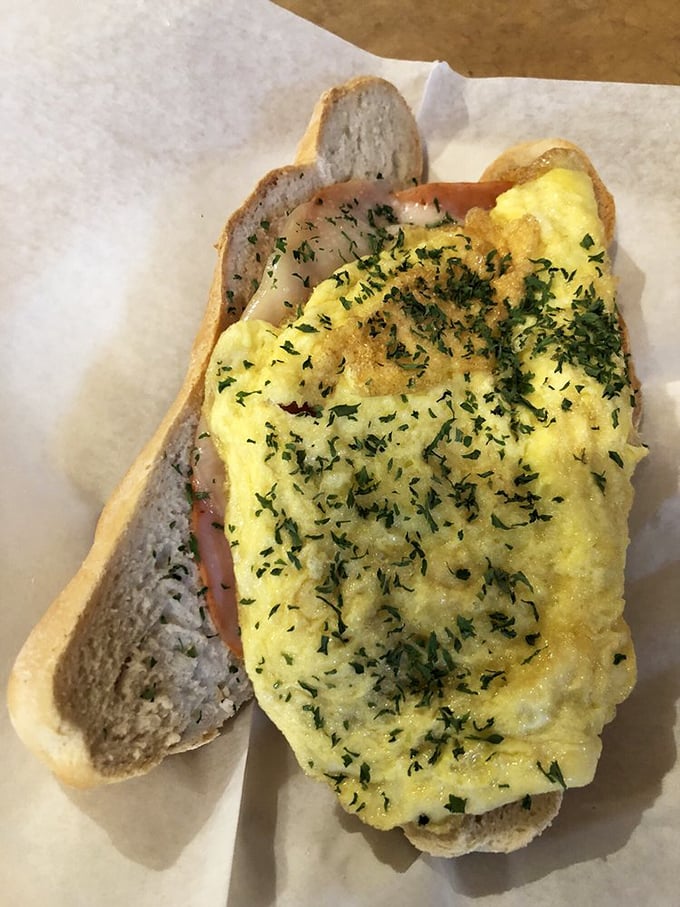 Breakfast sandwich perfection doesn't exi— Oh wait, it does. Fresh herbs sprinkled over fluffy eggs on house-made bread creates morning magic that puts your sad toaster to shame. 